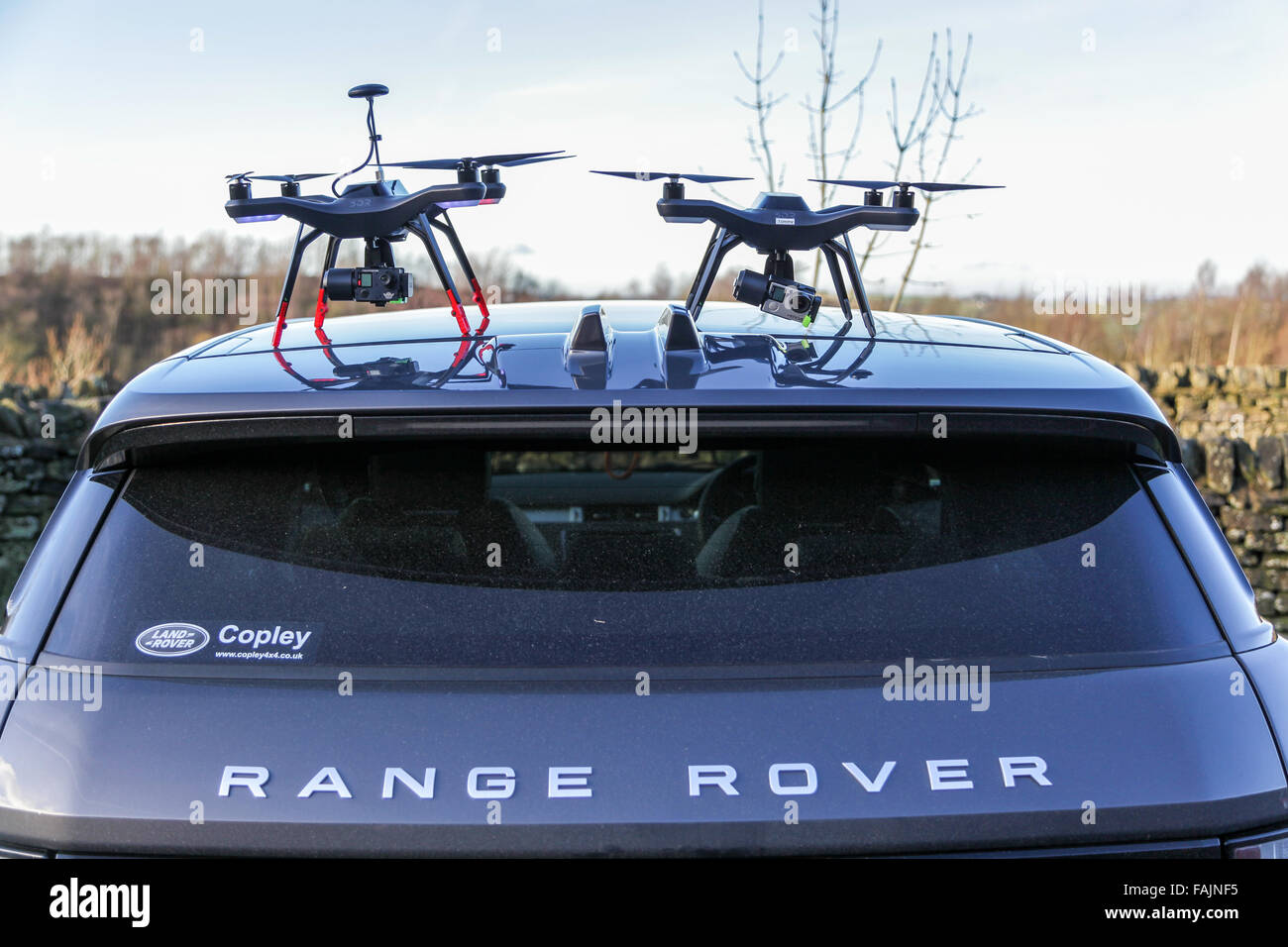 Drones ready to be deployed from the roof of a parked car Stock Photo ...