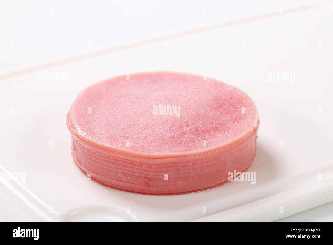 Thin slices of lean ham Stock Photo - Alamy