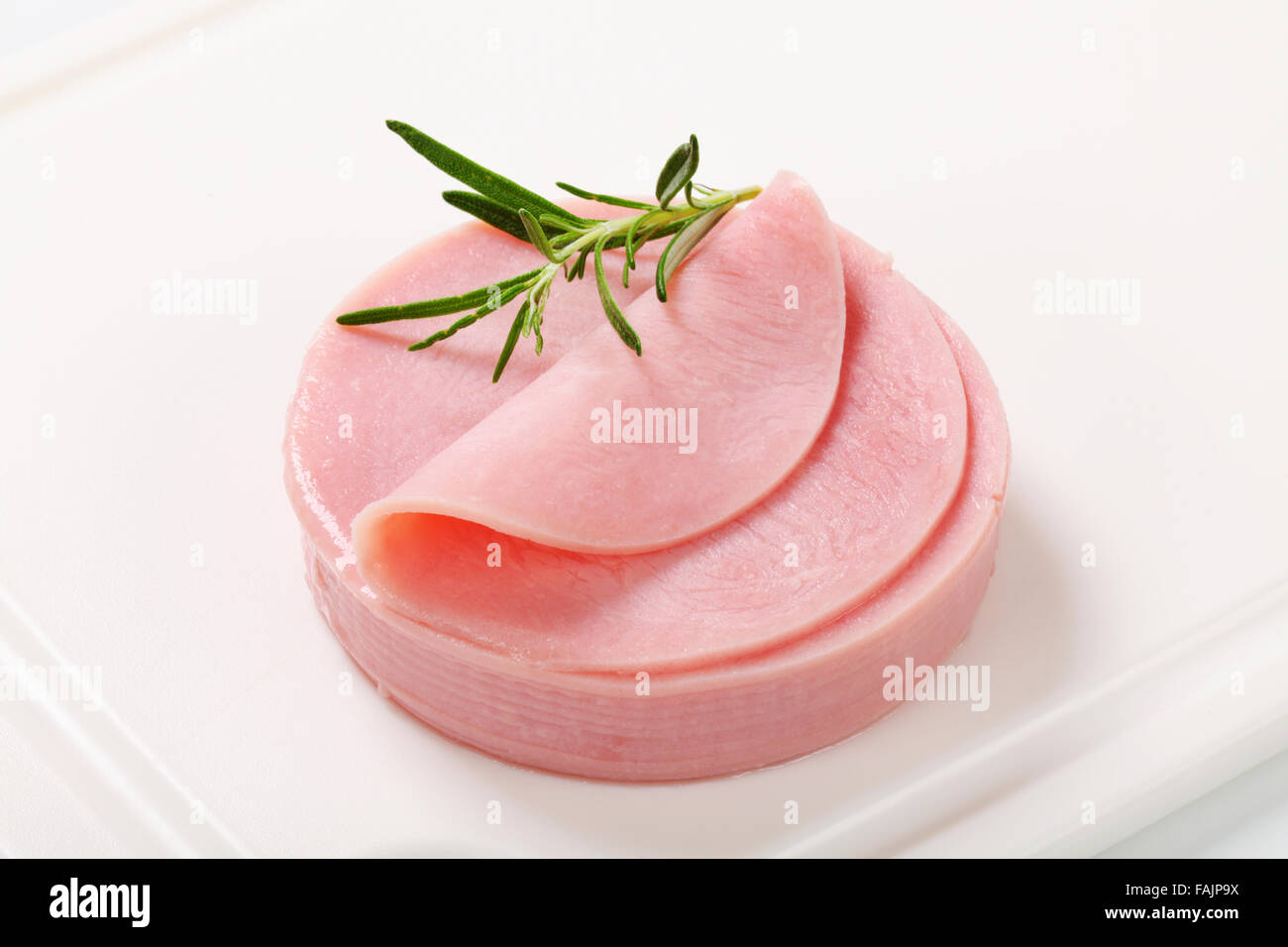 Thin slices of lean ham Stock Photo - Alamy