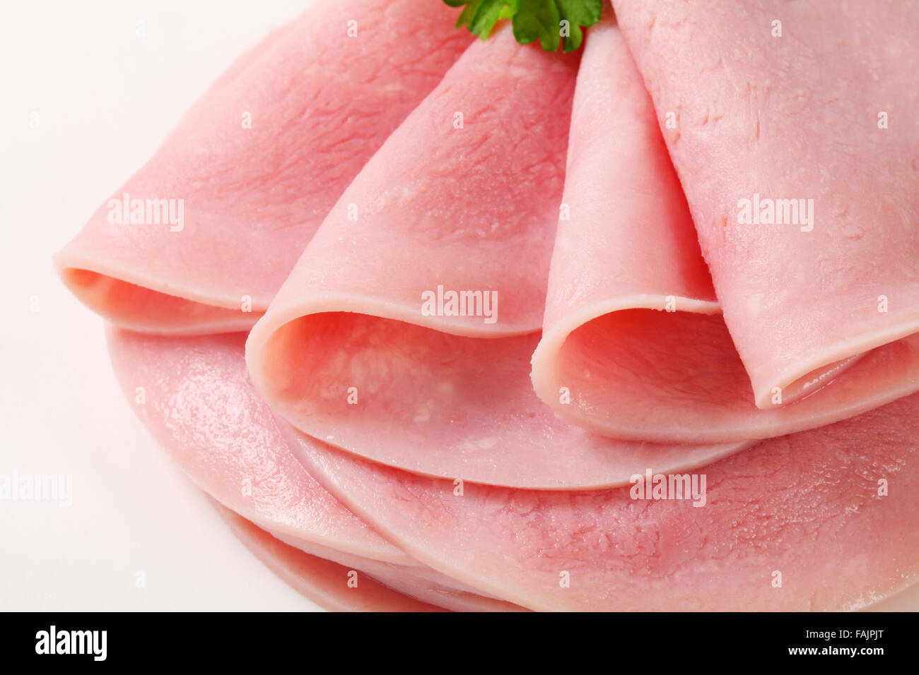 Thin slices of lean ham Stock Photo - Alamy