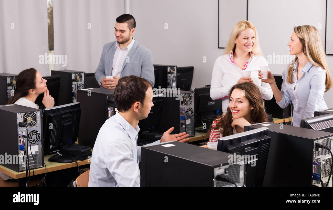 Happy employees positive manager celebrating hi-res stock photography ...