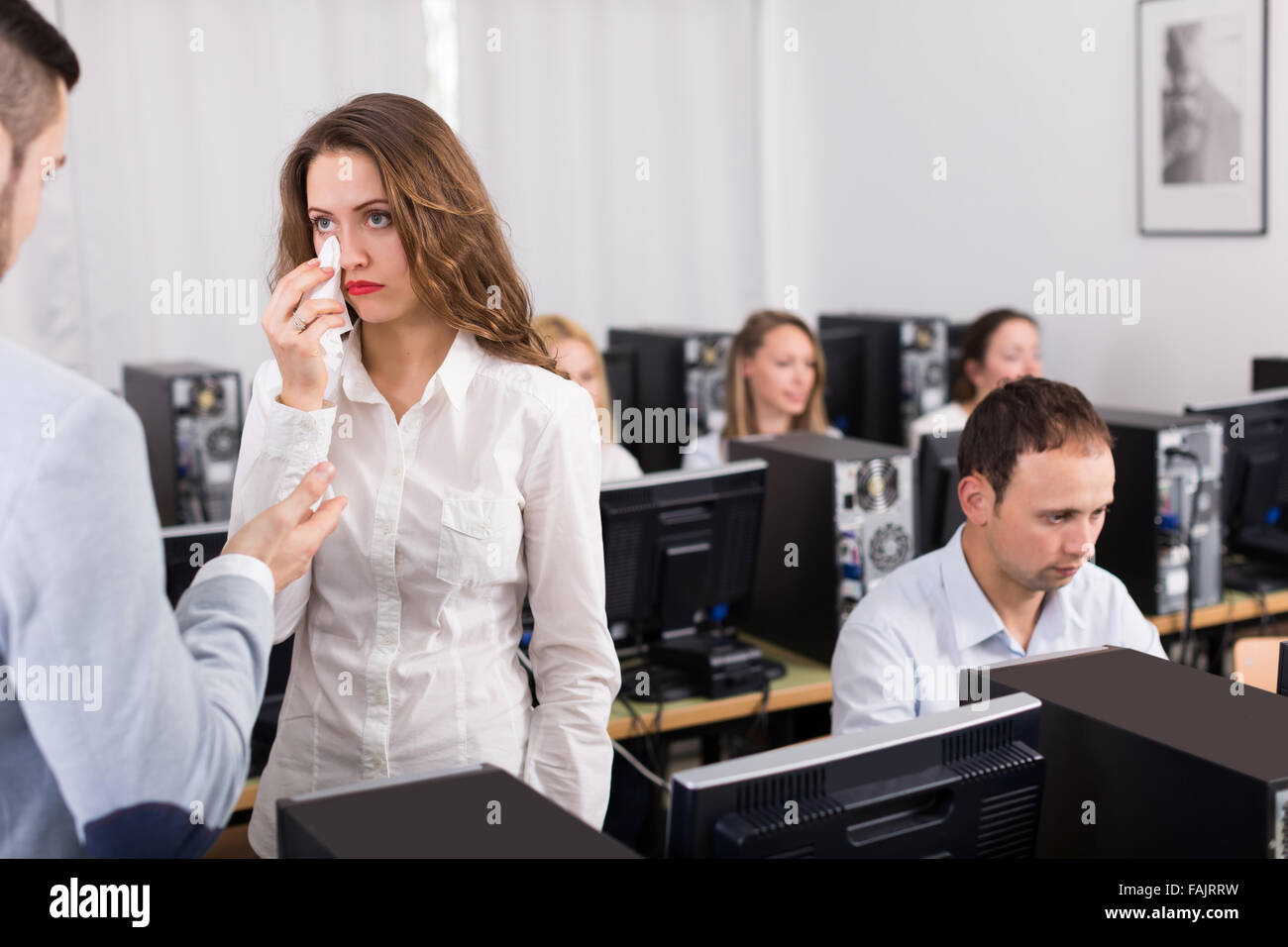boss and crying clerk at open space working area Stock Photo - Alamy