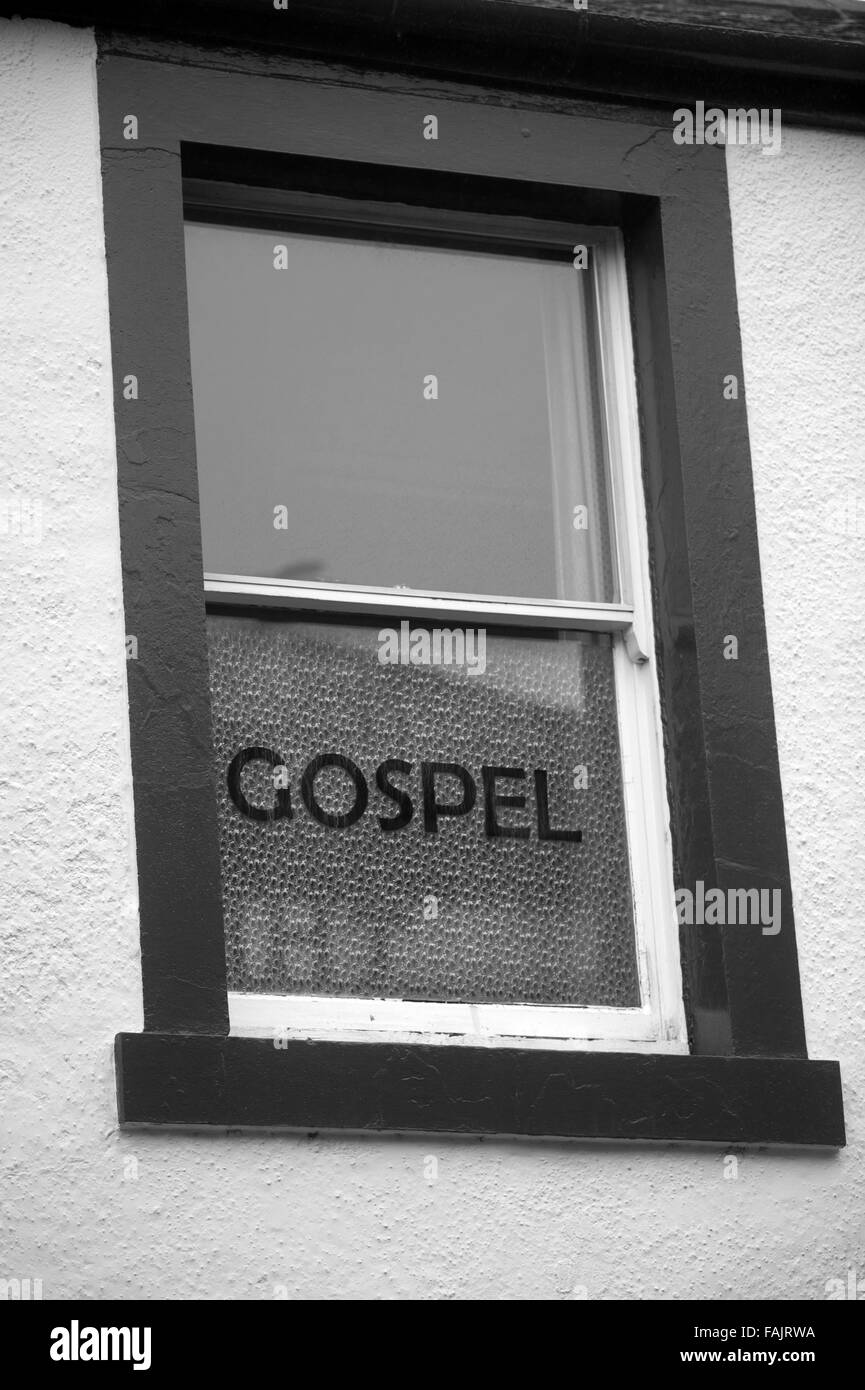 Gospel sign in window, Keswick Stock Photo - Alamy
