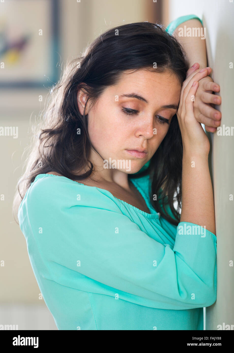 Depressed lonely brunette woman crying at home Stock Photo - Alamy