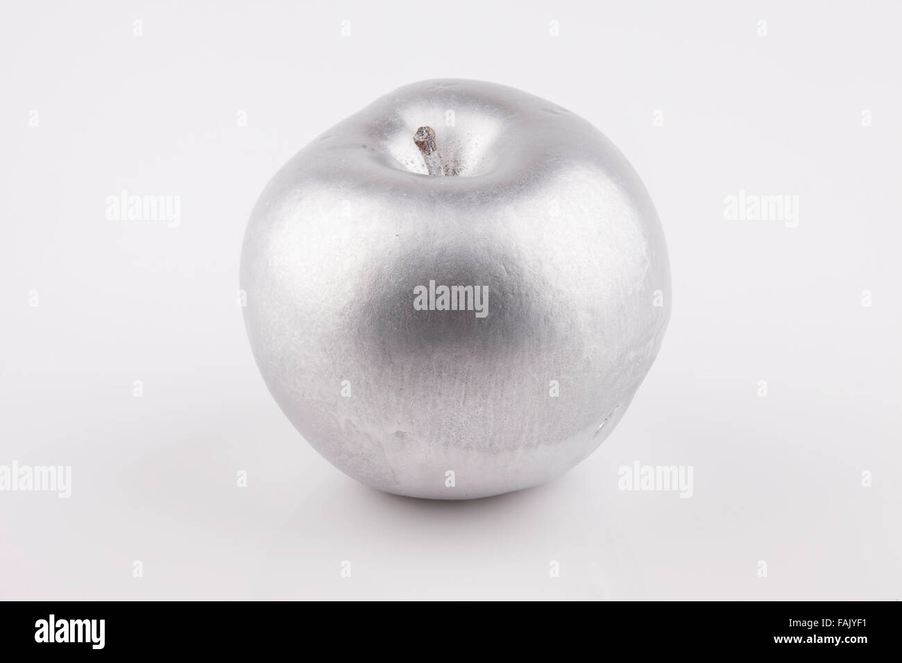 silver Apple on white background closeup Stock Photo - Alamy
