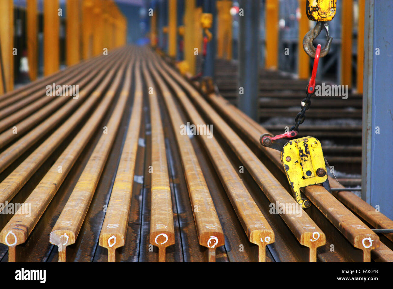 Long lengths of rolled steel railway track Stock Photo - Alamy