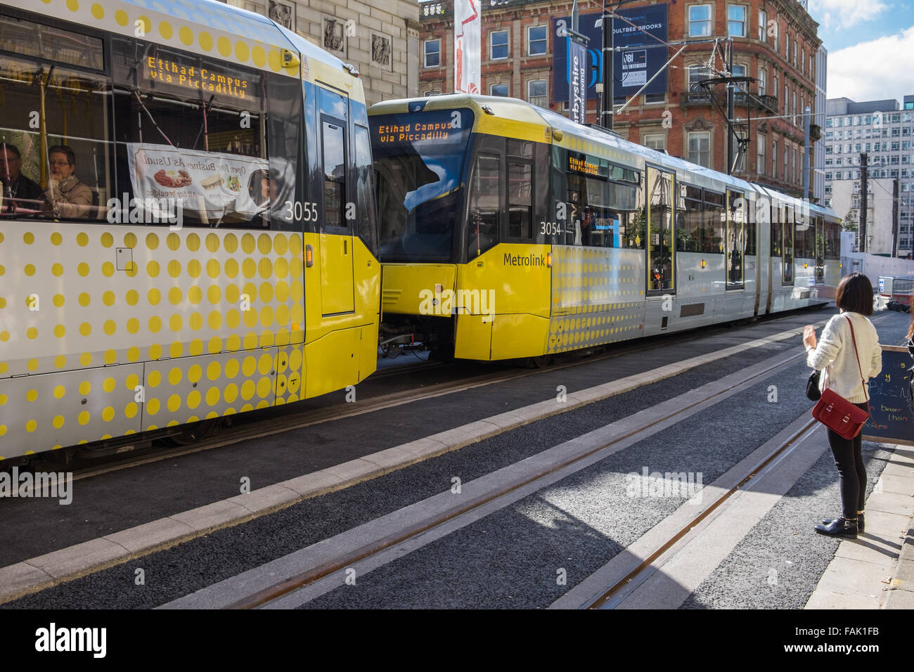 A Metrolink Tram on Mosley Street, Manchester, UK Stock Photo - Alamy