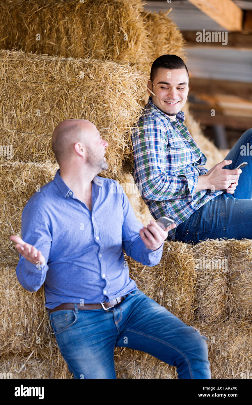 Two workers resting grass hi-res stock photography and images - Alamy