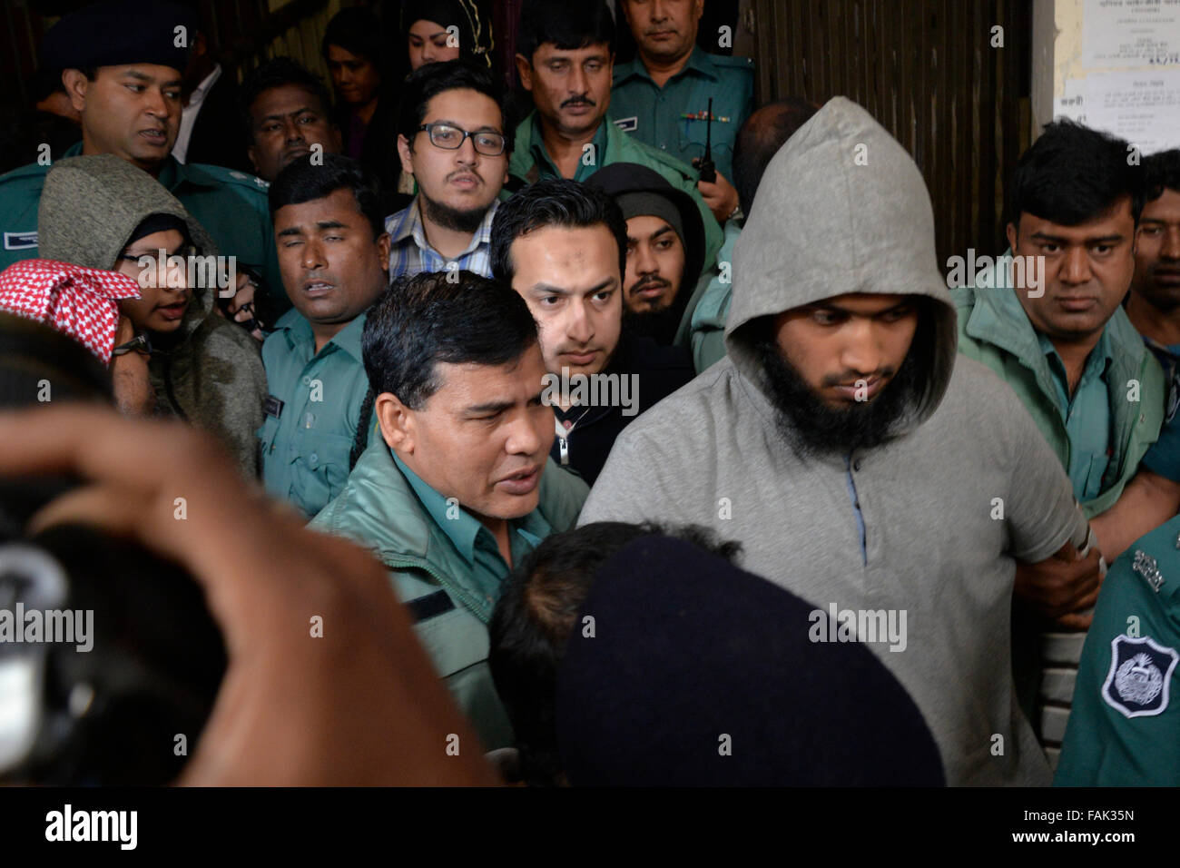 Dhaka, Bangladesh. 31st Dec, 2015. Bangladesh police officials escort ...