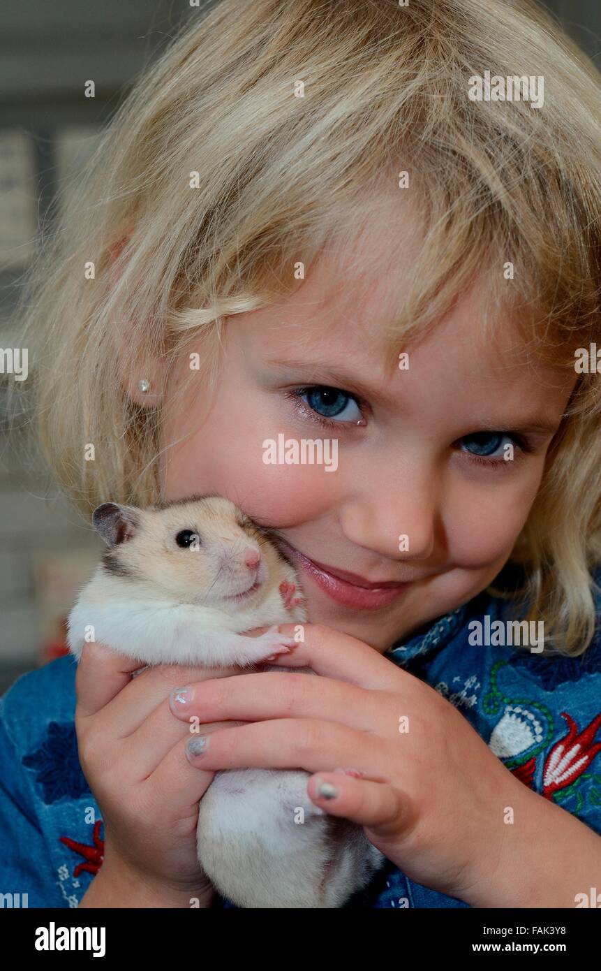 Girl and hamster hi-res stock photography and images - Alamy
