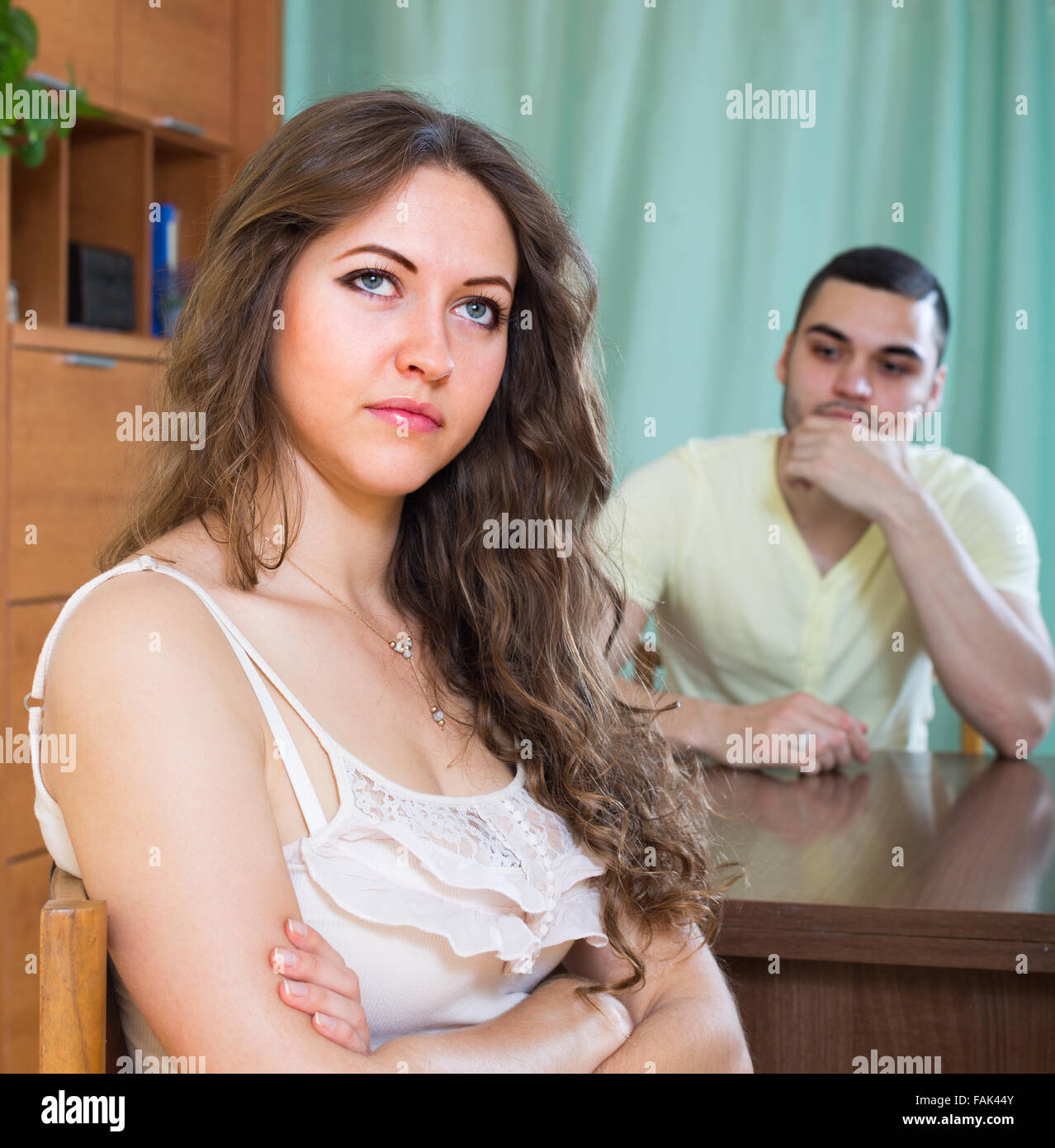 Young married women having conflict with husband at home Stock Photo ...