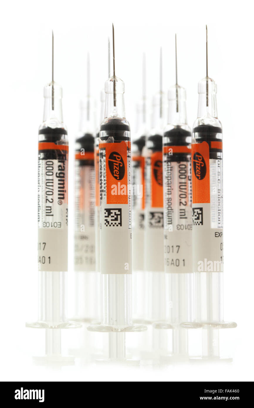 Collection of Single Dose Syringes from Pfizer on a White Background ...