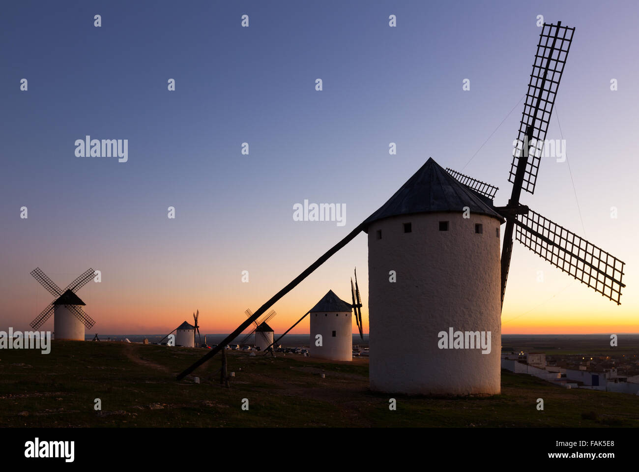 Wind mills at field in dusk Stock Photo - Alamy