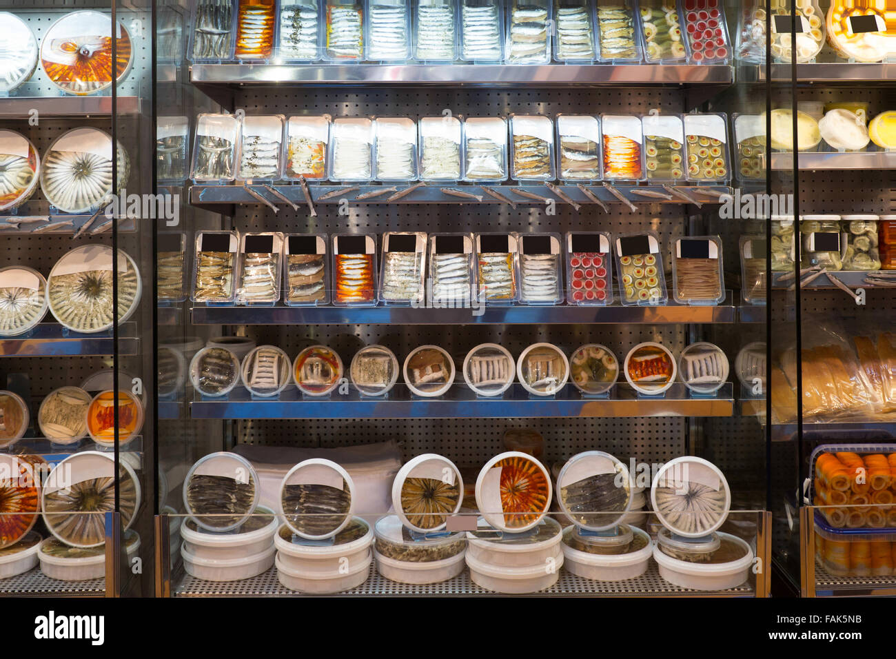 Showcases for fish food articles in the store Stock Photo - Alamy