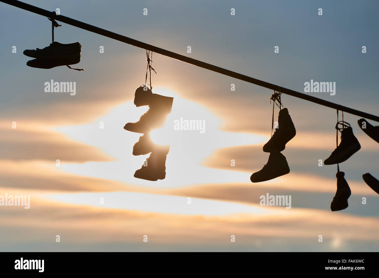Shoe concept hanging silhouette hi-res stock photography and images - Alamy