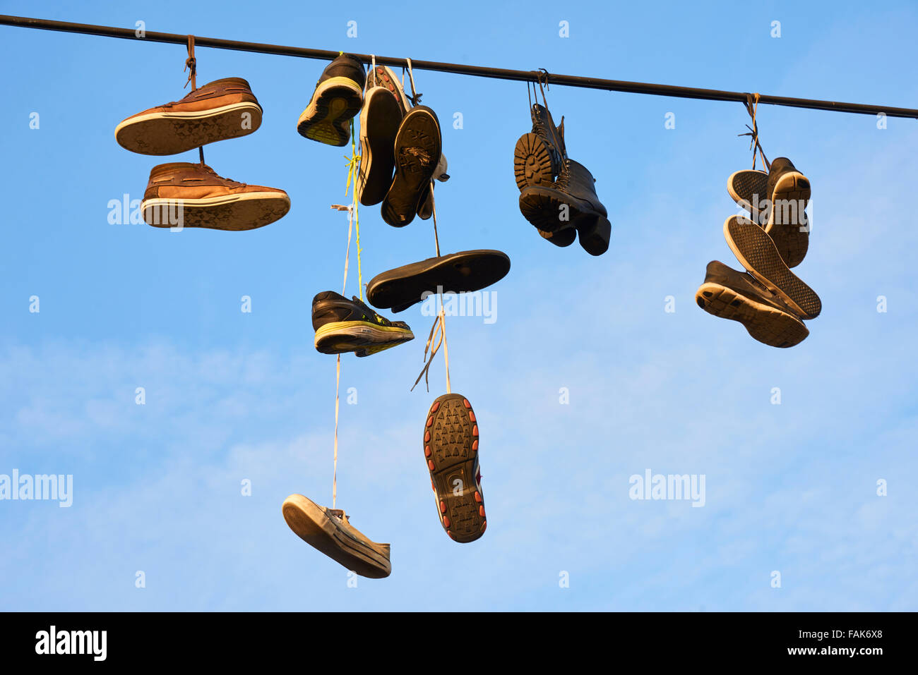 Shoe concept hanging silhouette hi-res stock photography and images - Alamy