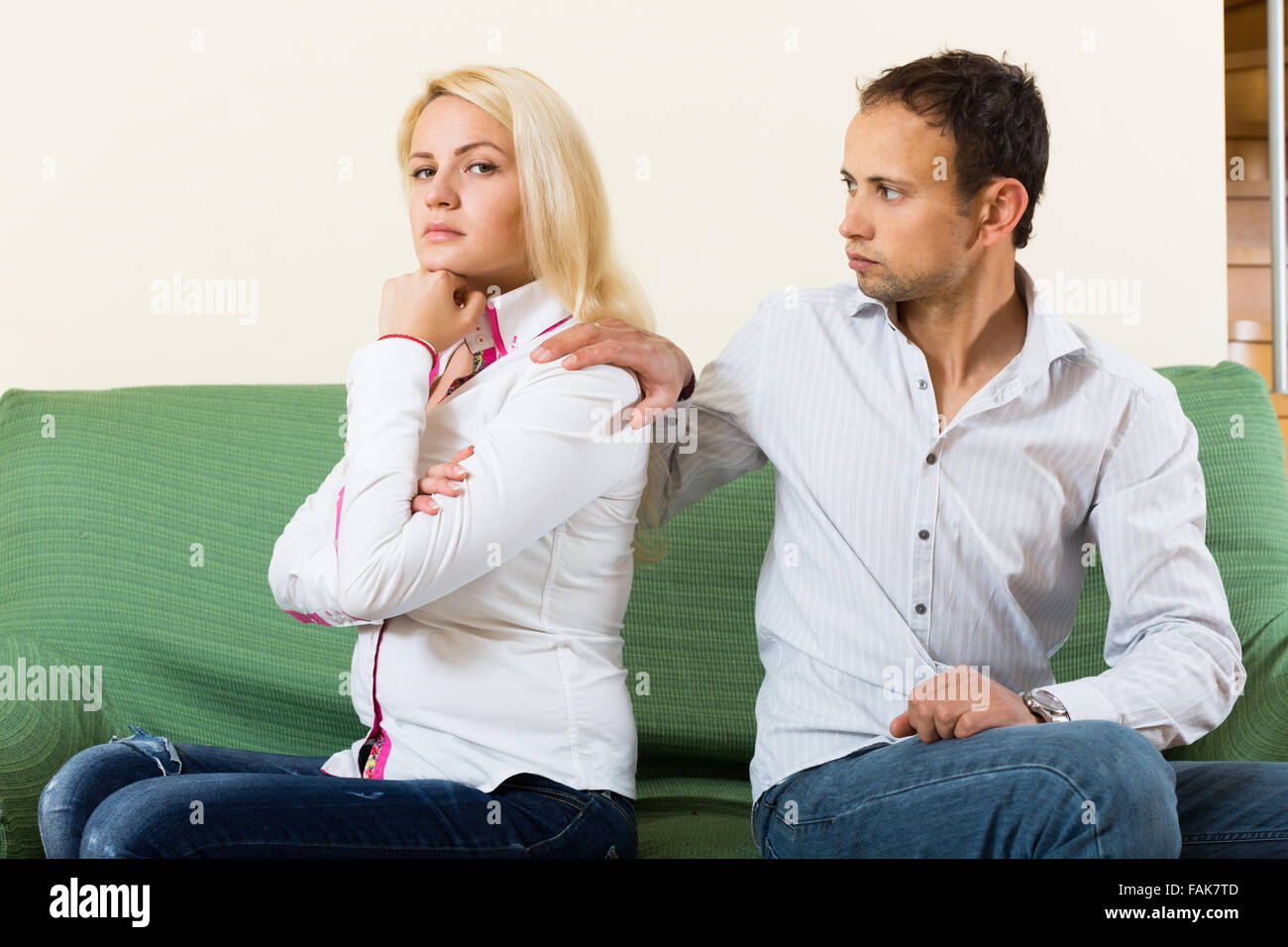 Young married american couple having quarrel at home Stock Photo - Alamy