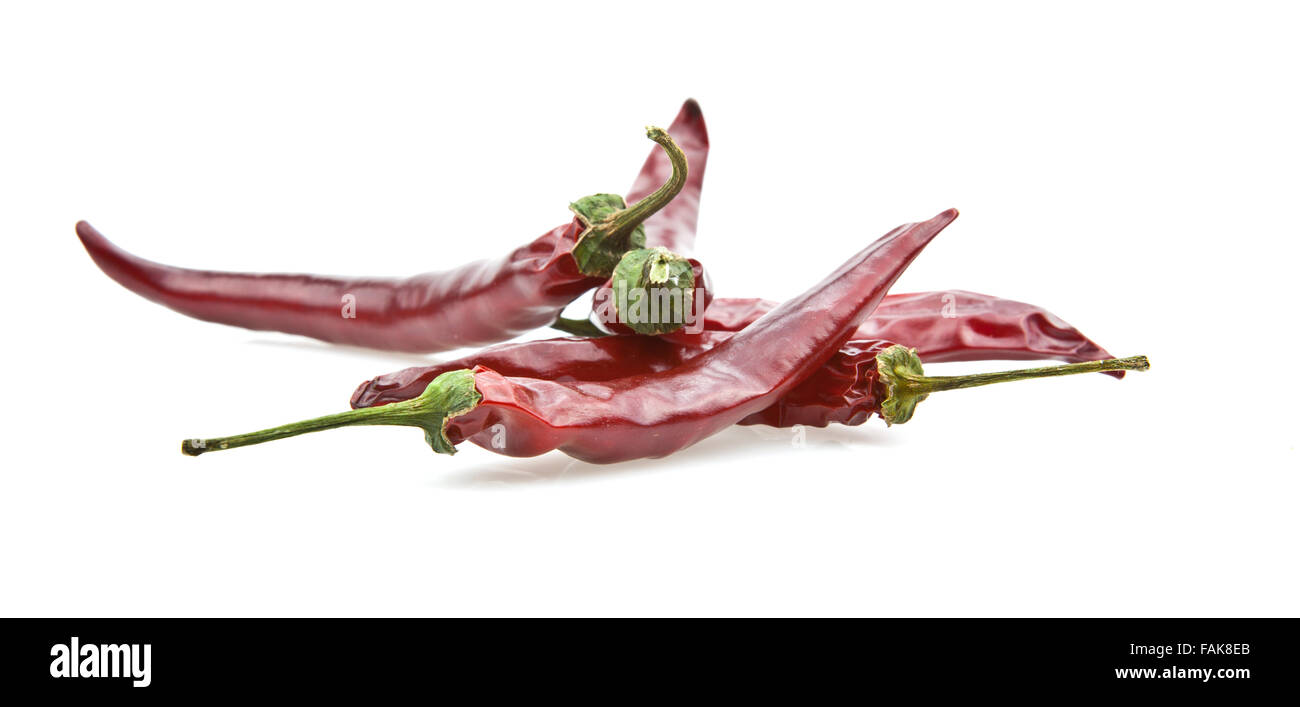 Dried Whole Red Chillies on a white background Stock Photo - Alamy
