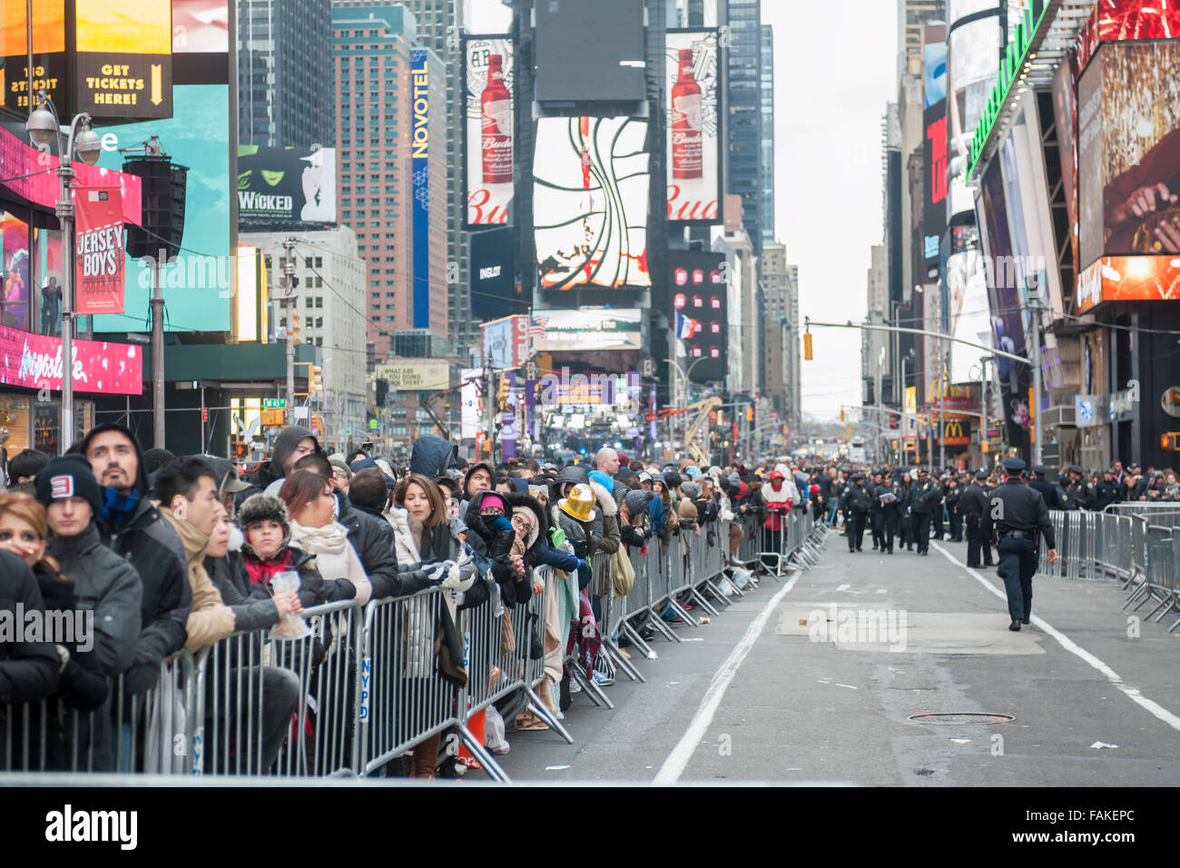 Revelers cram into pens in Times Square in New York hours before the ...