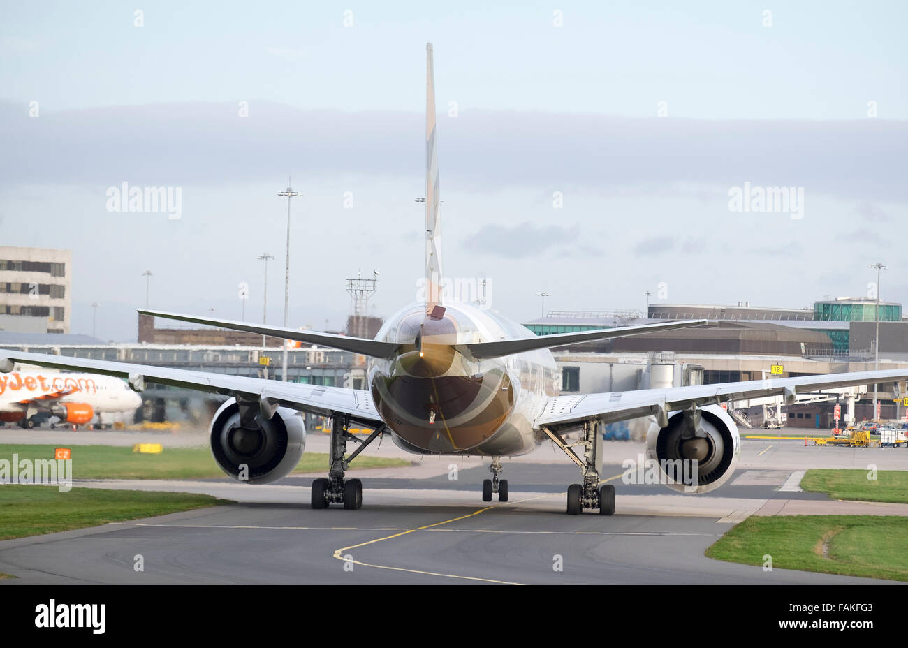 Passenger Plane prepares for take off at manchester Airport. Uk Stock ...