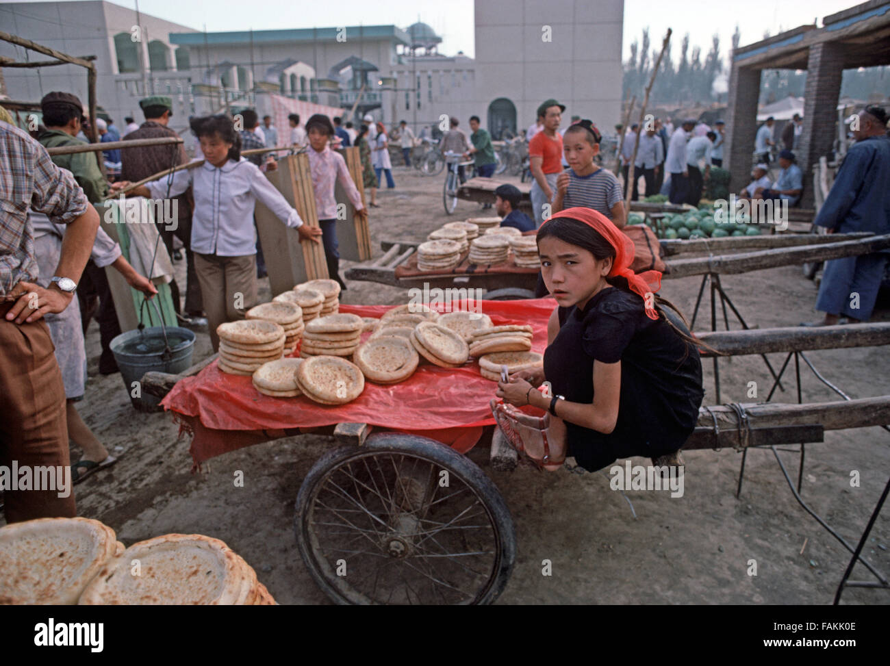 Selling Nan flat bread in Turpan market, Xinjiang Prvince, China Stock ...