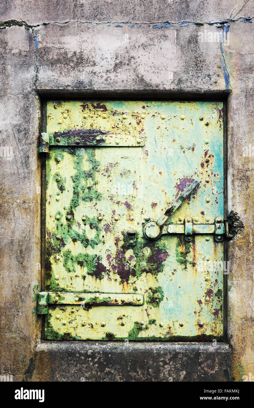 Closed rusty green steel door in concrete bunker window, Artillery Hill ...