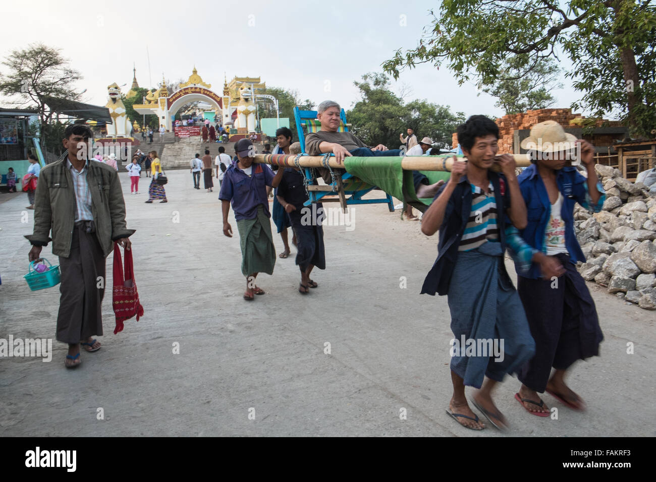 golden,rock,Myanmar,Burma,gold,Kyaitiyo.Being carried,palanquin,chair ...