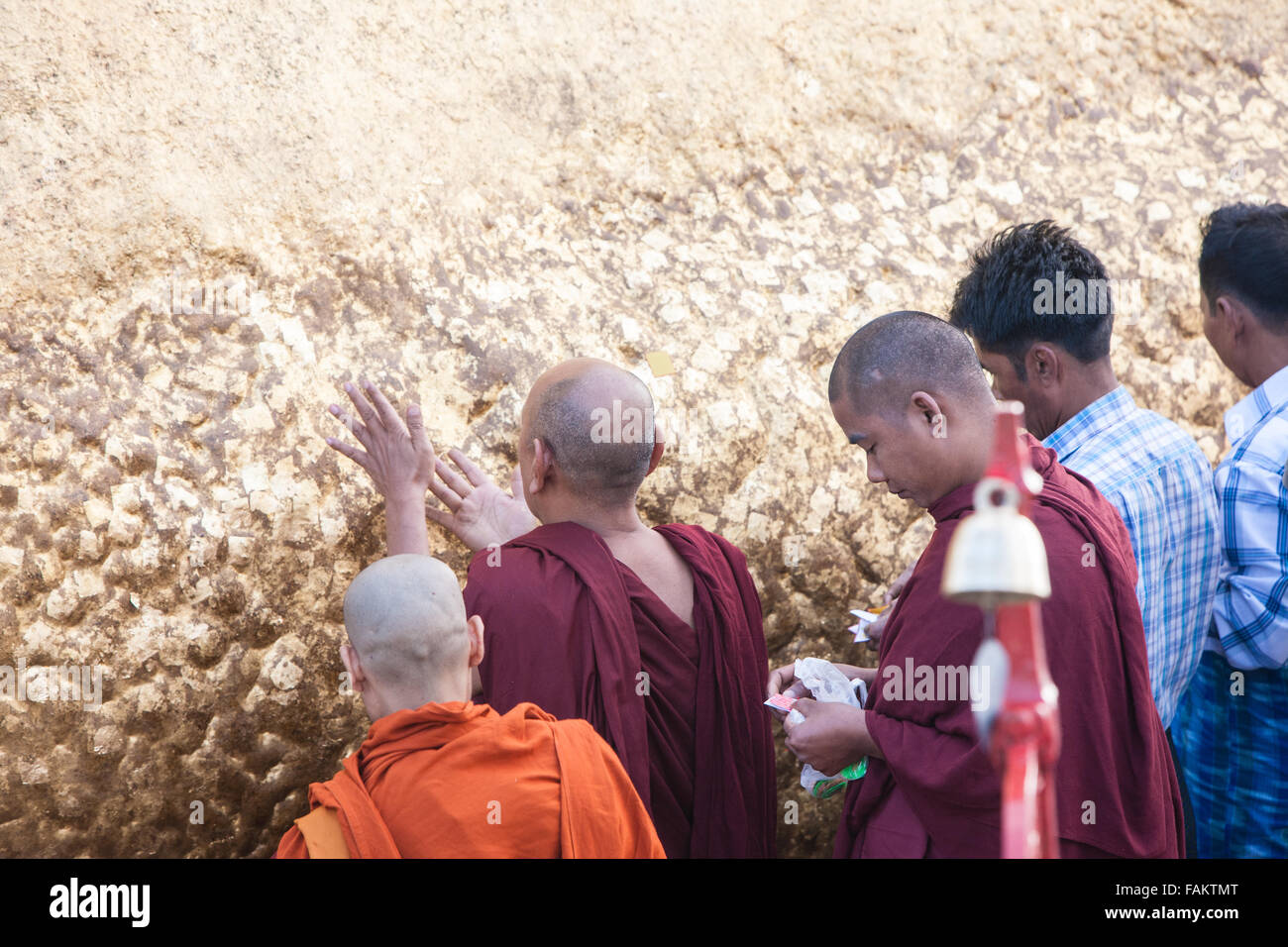 golden,rock,Myanmar,Burma,gold,Kyaitiyo,Buddhist,Putting gold leaf on ...