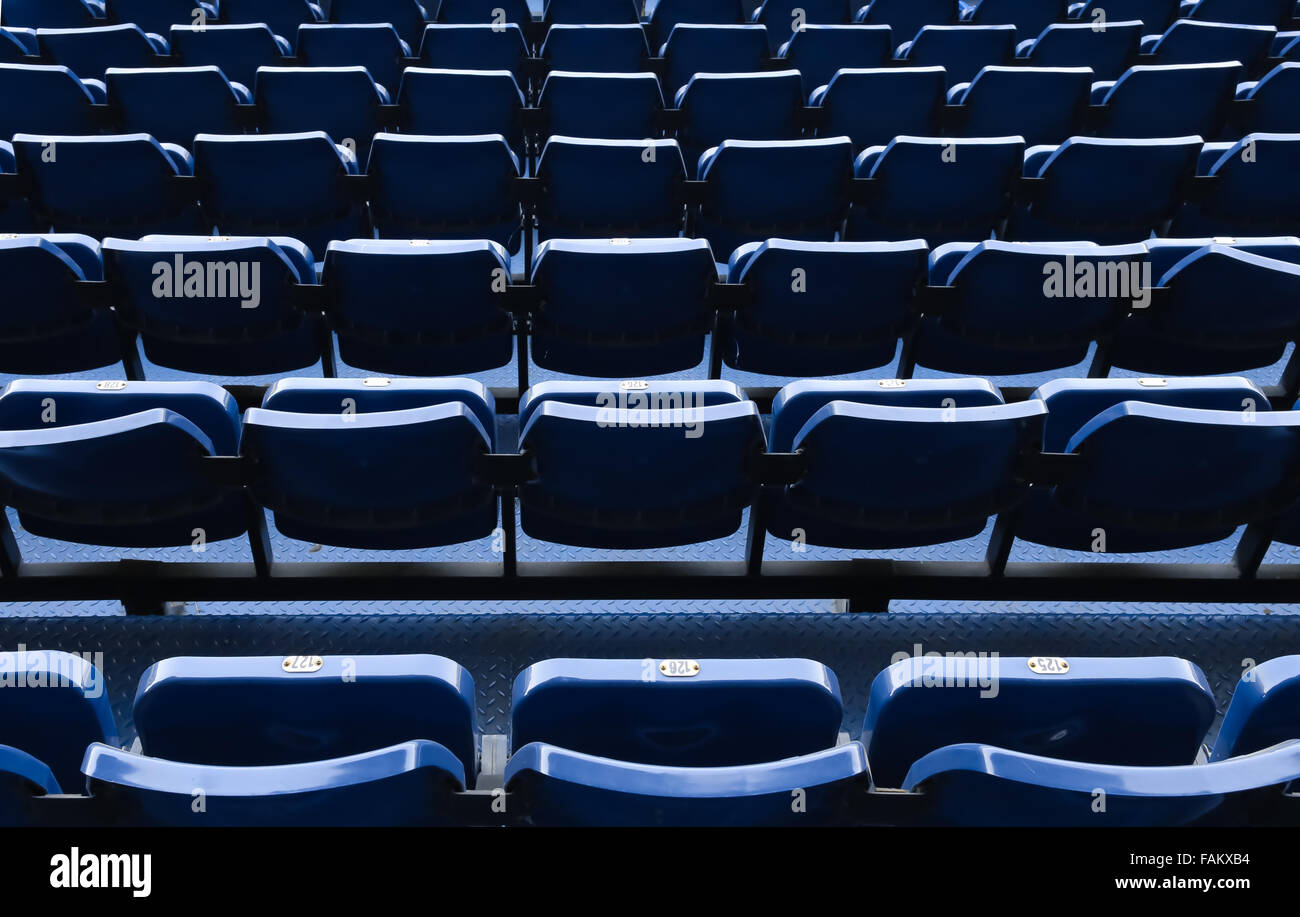 Plenty of dark blue chair in football stadium Stock Photo - Alamy