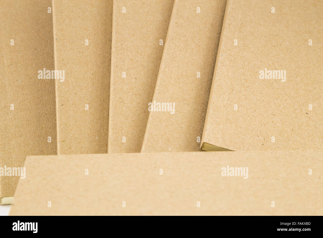Part of book's cover in brown color Stock Photo - Alamy