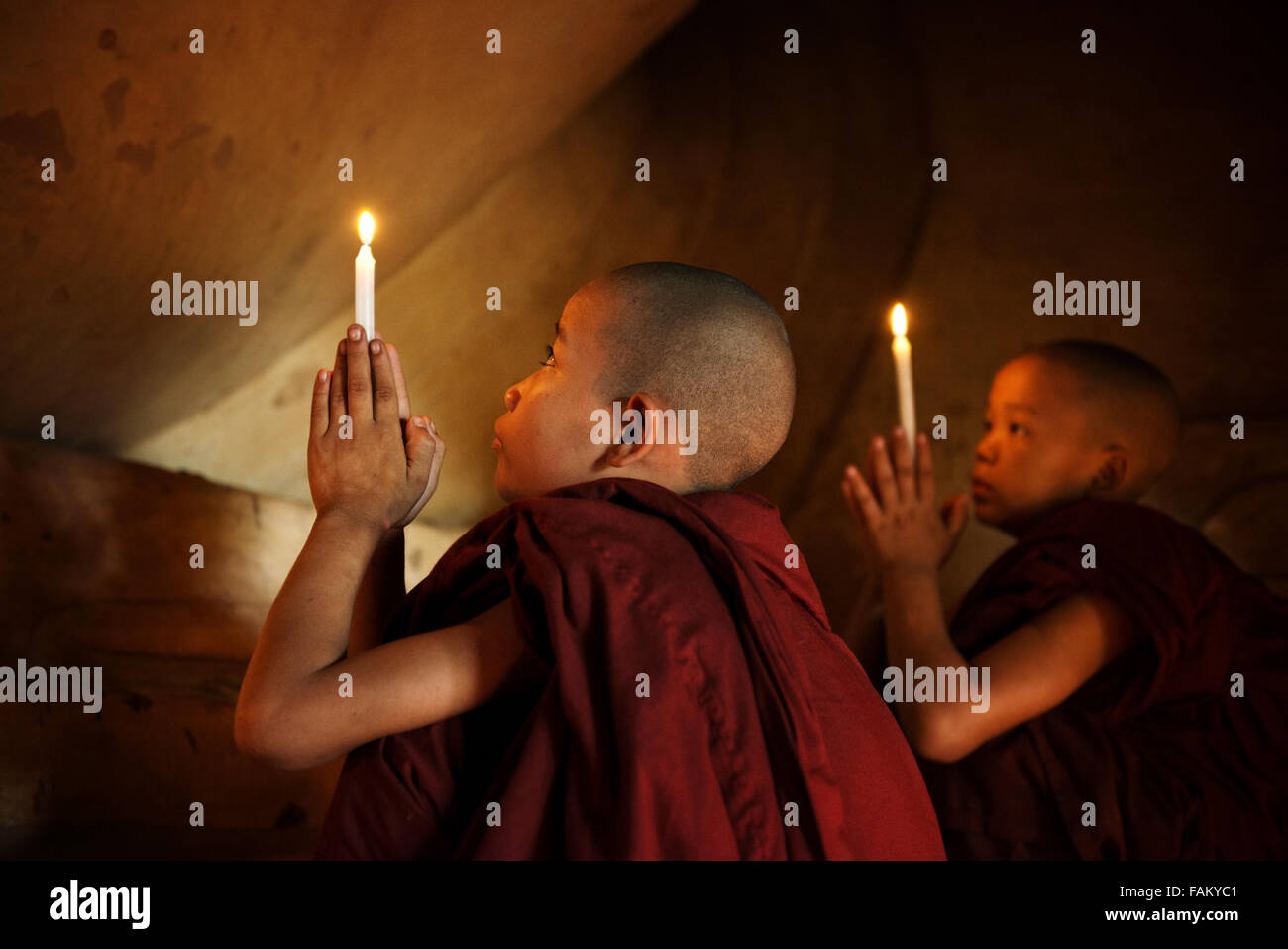 Novice monks praying hi-res stock photography and images - Alamy