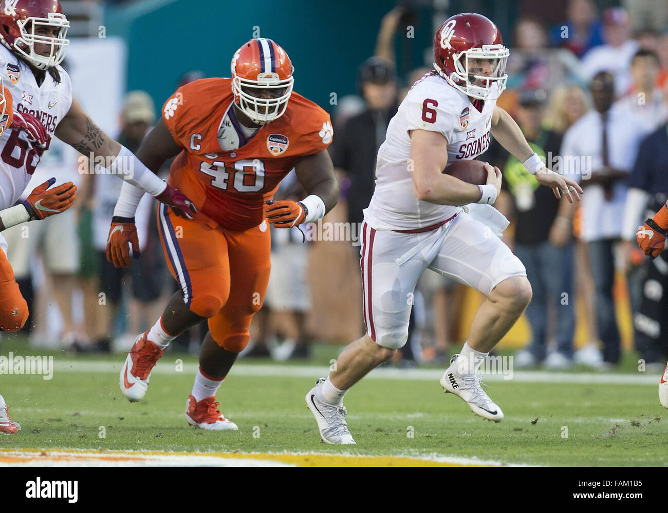 Miami, Florida, USA. 31st Dec, 2015. Oklahoma quarterback Baker Mayfield (6) runs with the ball ...