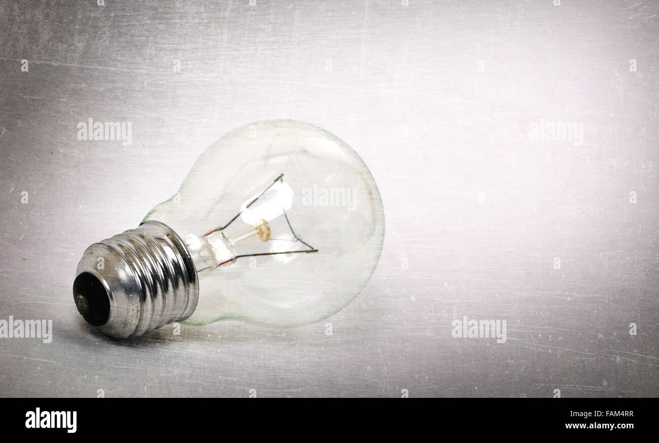 Old lightbulb isolated on a white background - Vintage look Stock Photo ...