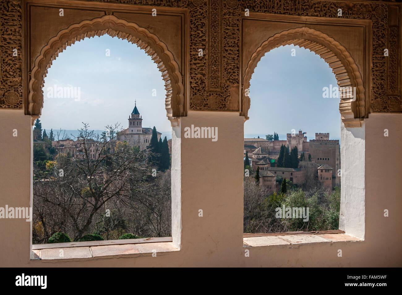 Nice arch windows in ancient Arabian palace Alhambra. Granada, Spain ...