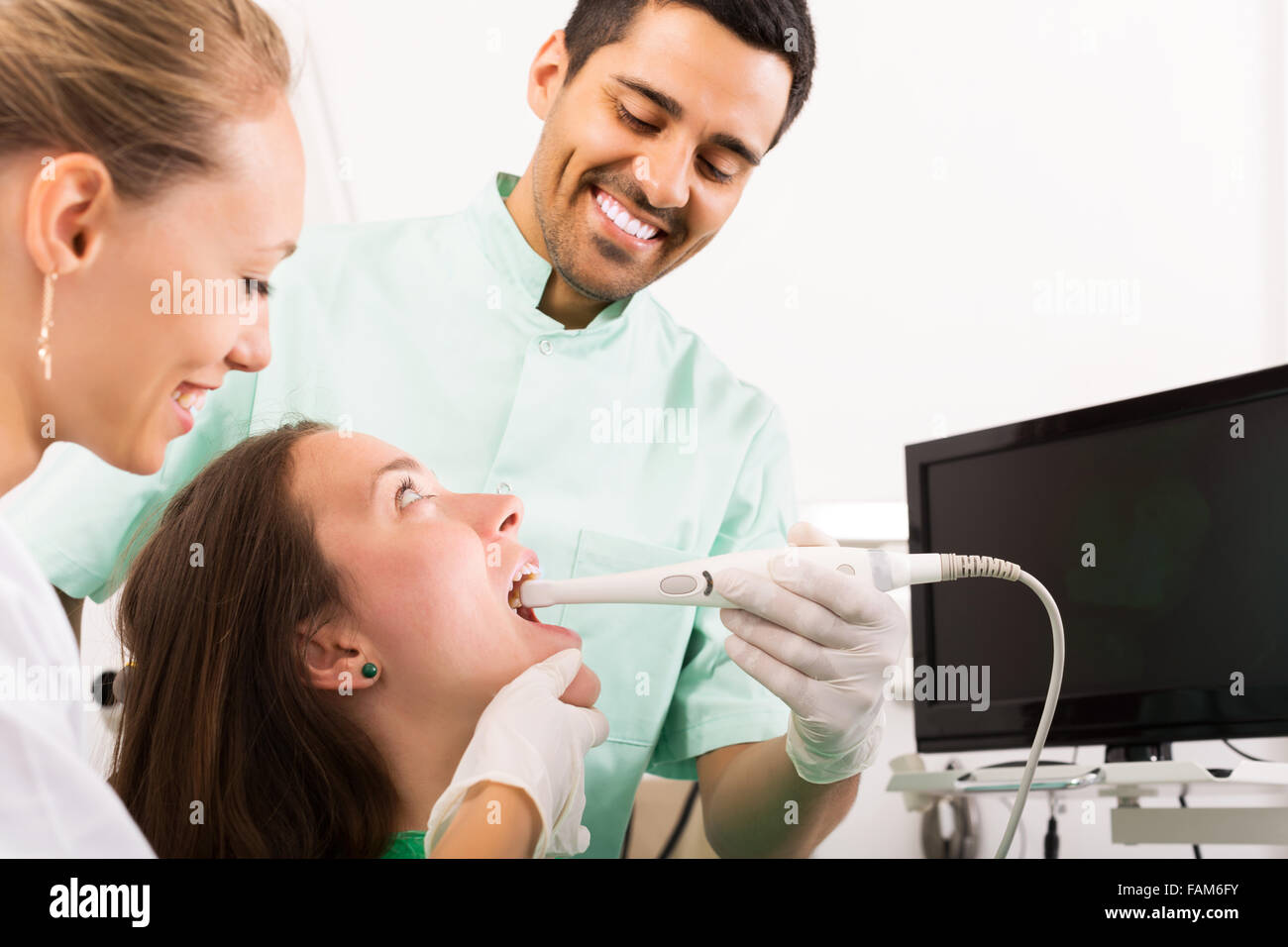 Patient checking the teeth on computer equipment Stock Photo - Alamy