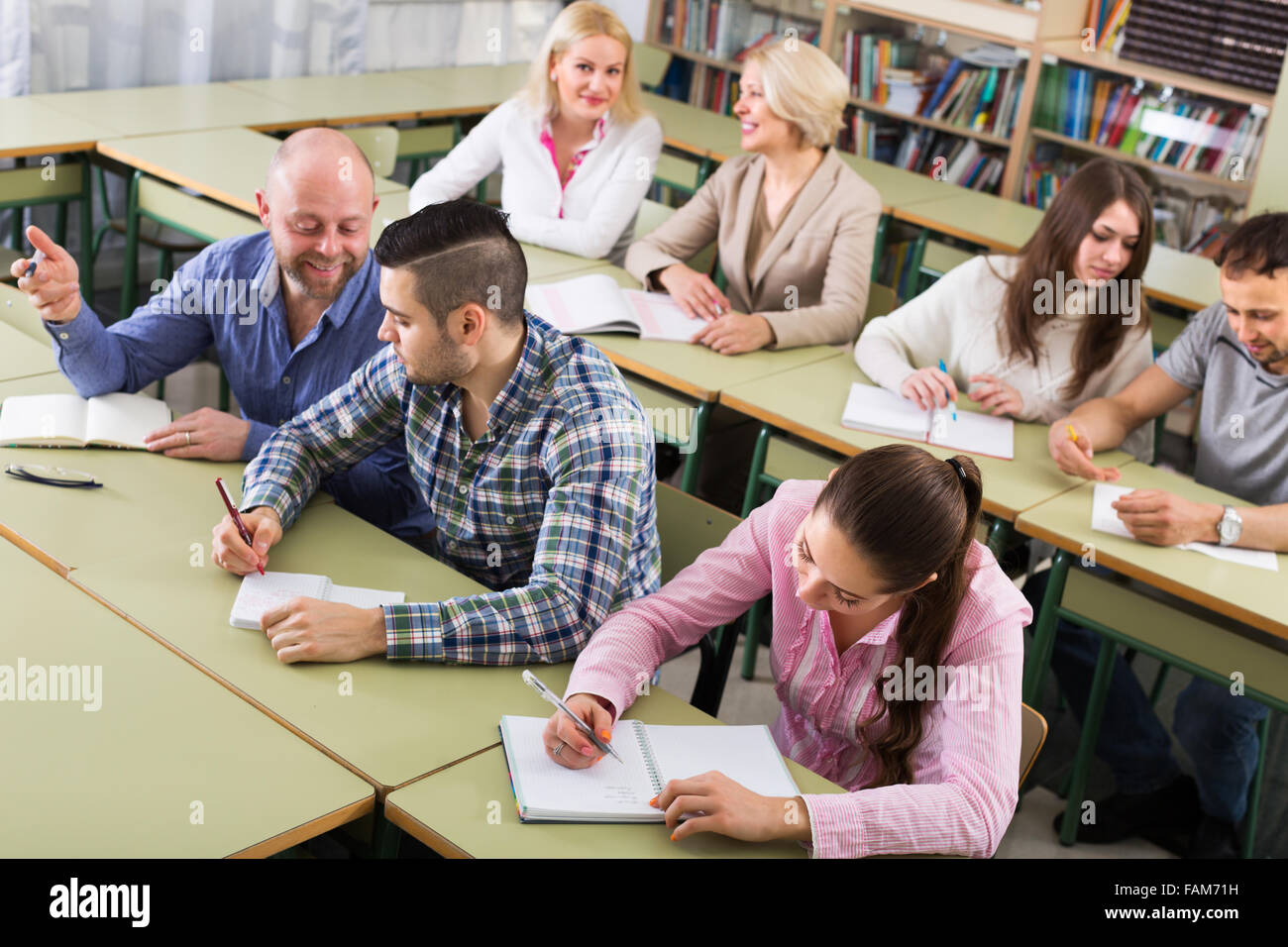 Cheerful adult students of different age at extension courses Stock ...