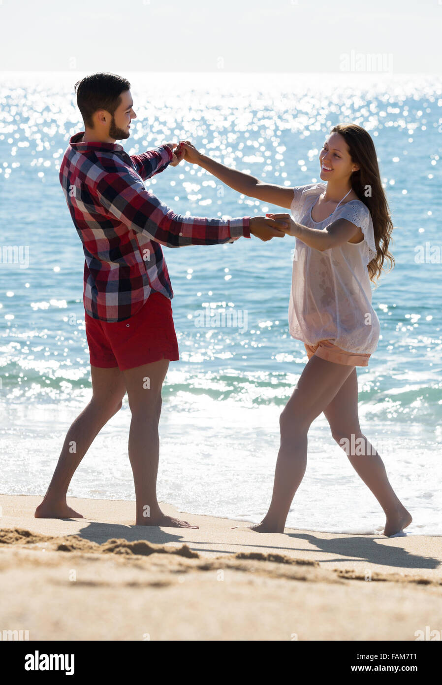 Smiling newly married couple having homeymoon at tropical beach Stock ...