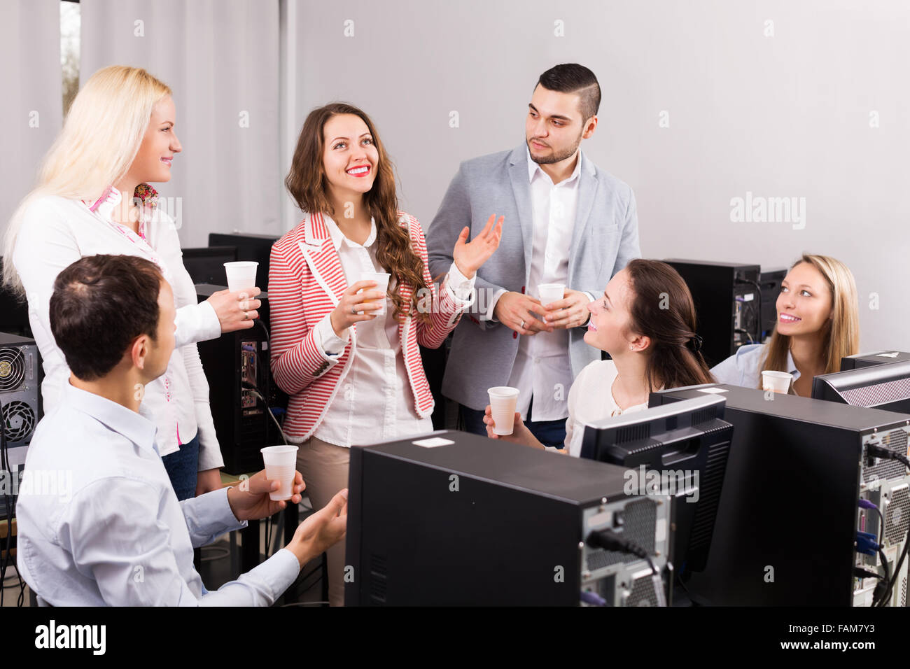 Happy business team celebrating successful project close-out Stock ...