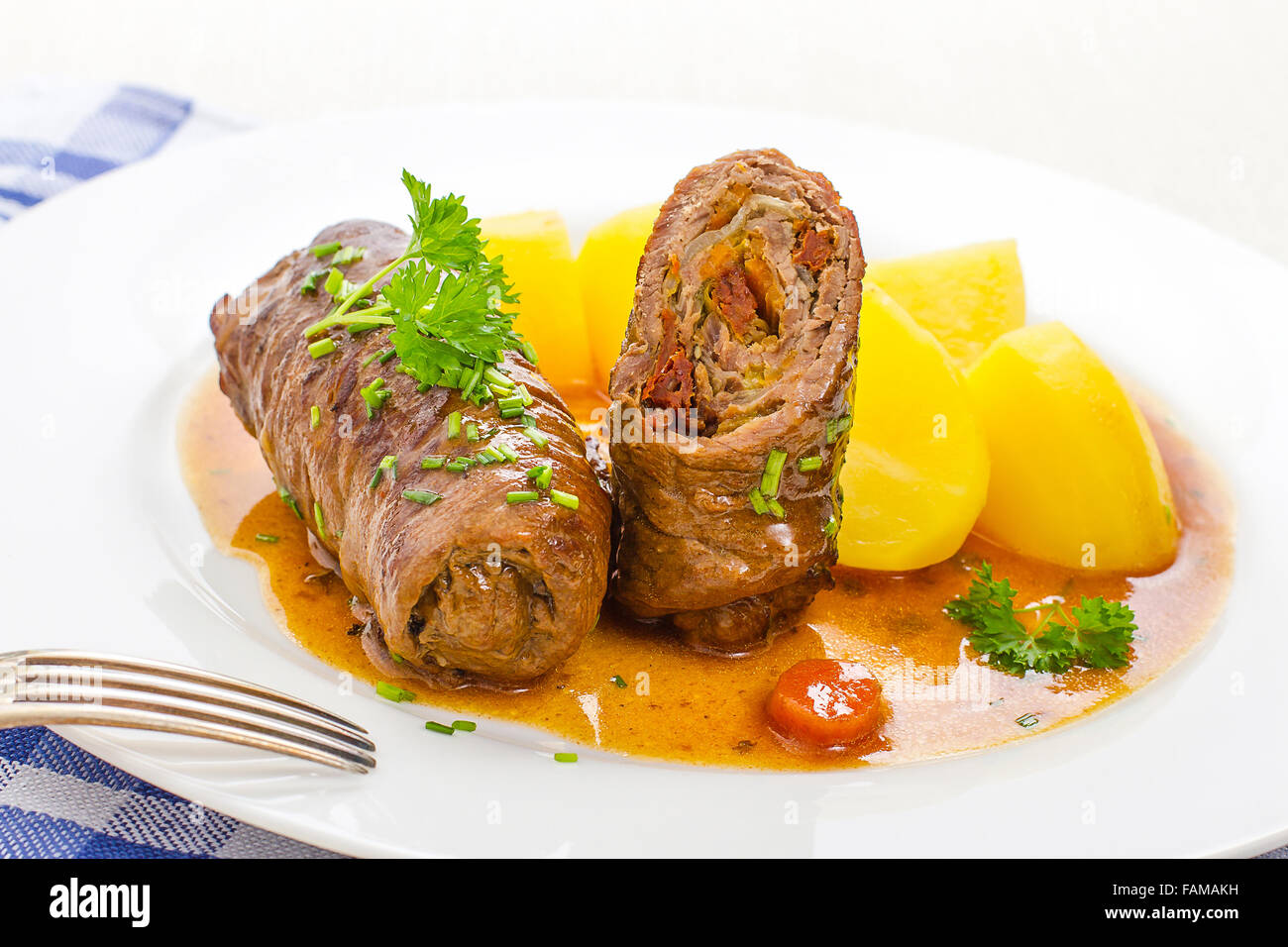 Sliced roulades beef with vegetable filling, potato and sauce Stock ...