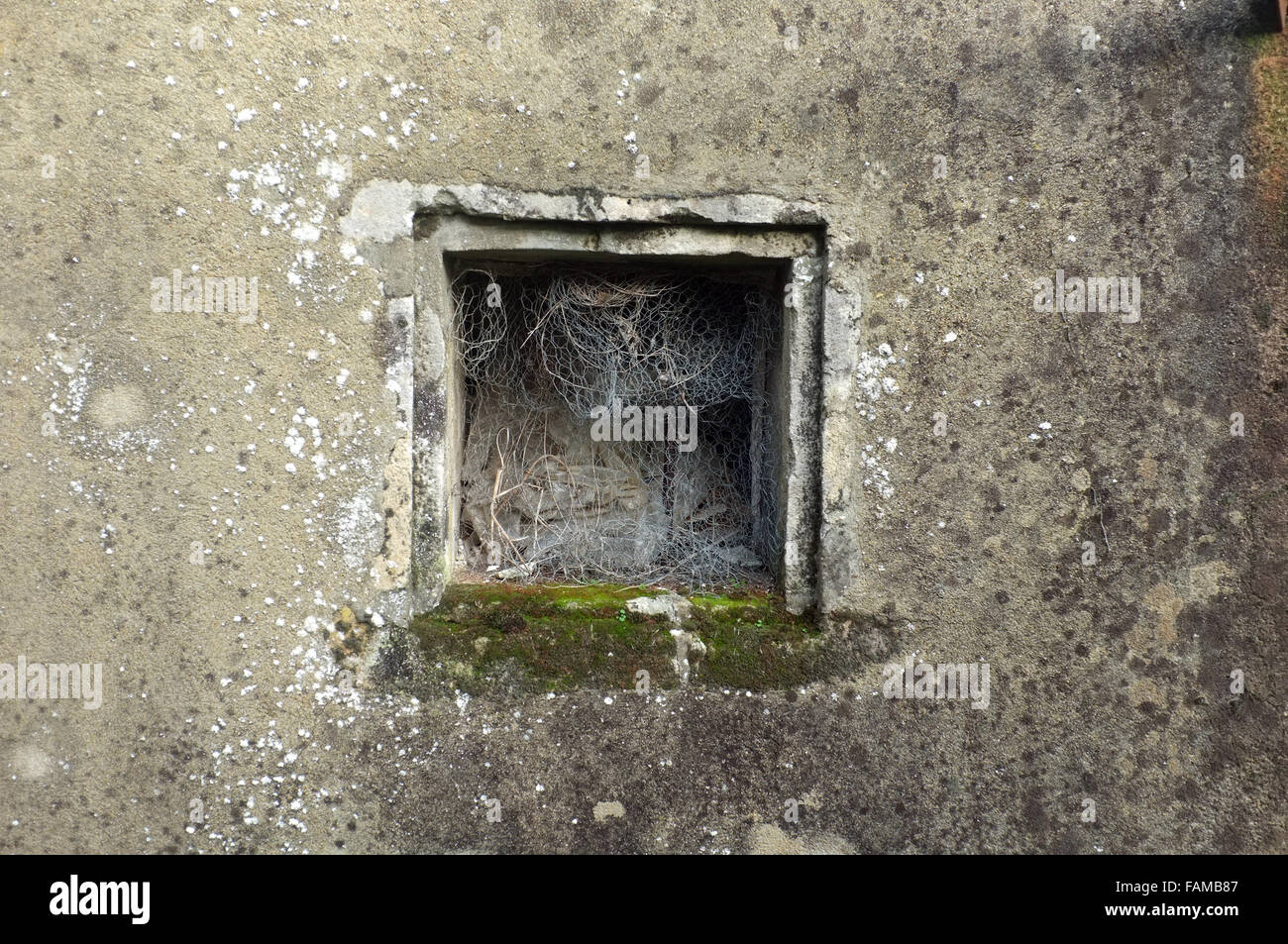 Rusty little window on building Stock Photo - Alamy
