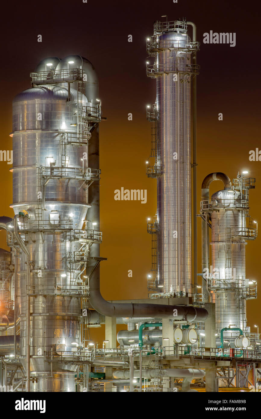 Oil refinery at night Stock Photo - Alamy