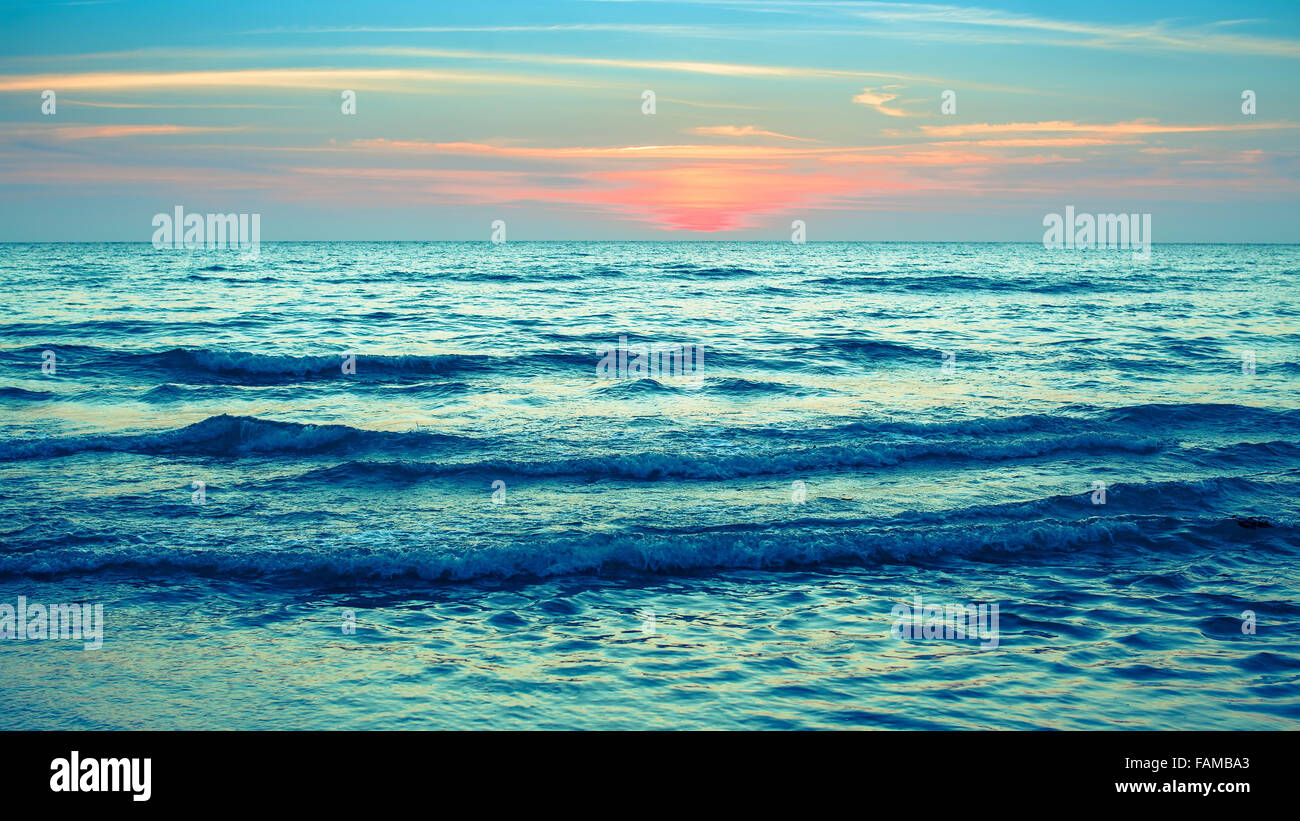 A stunning sunset at the sea Stock Photo - Alamy