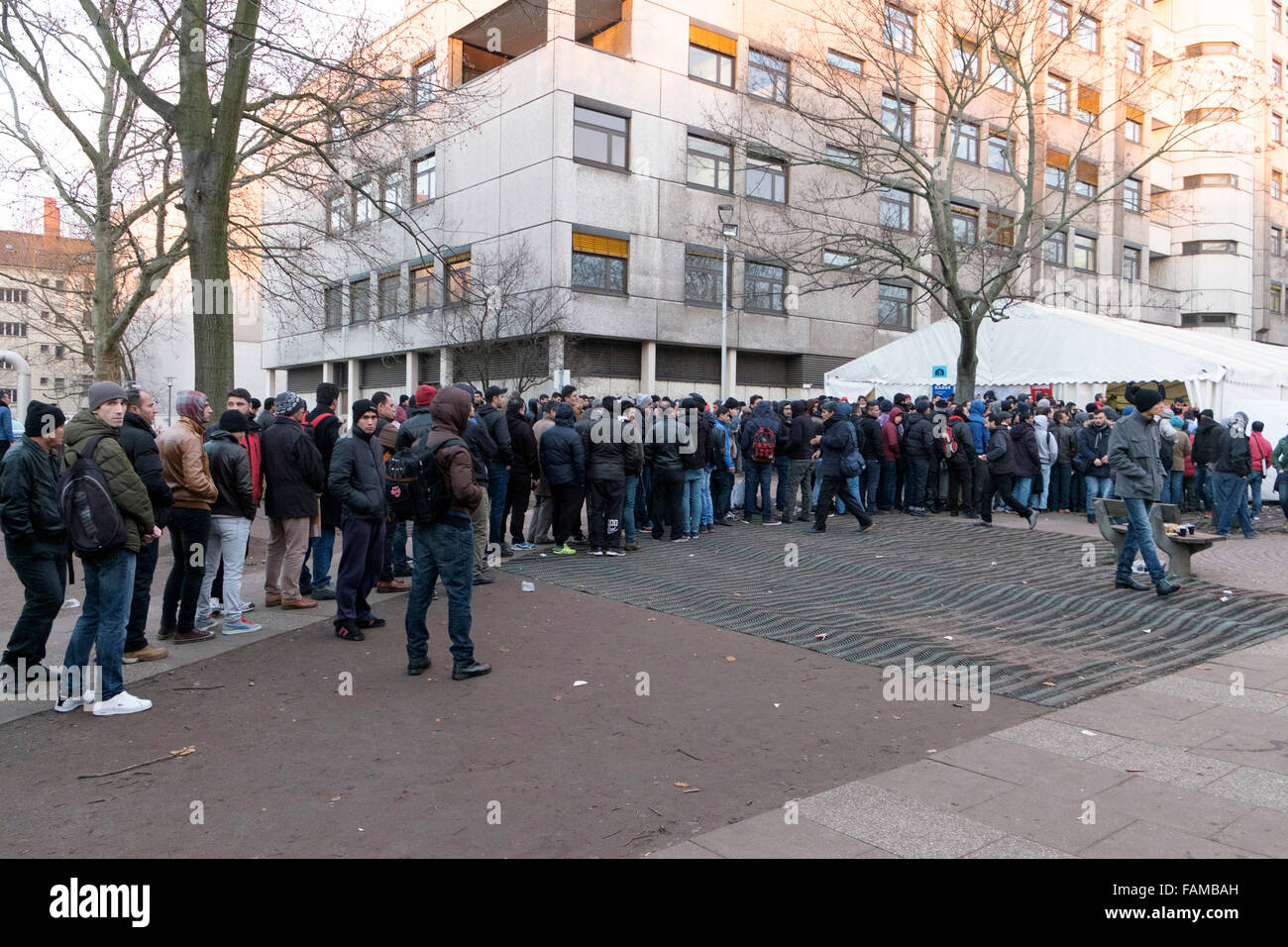 Refugees queue to be processed and registered Stock Photo - Alamy