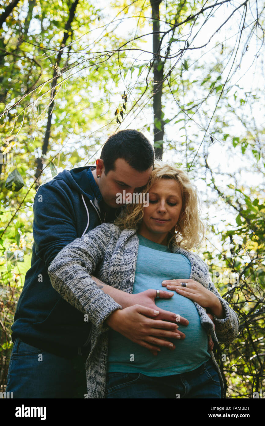 Happy young couple expecting a baby Stock Photo - Alamy