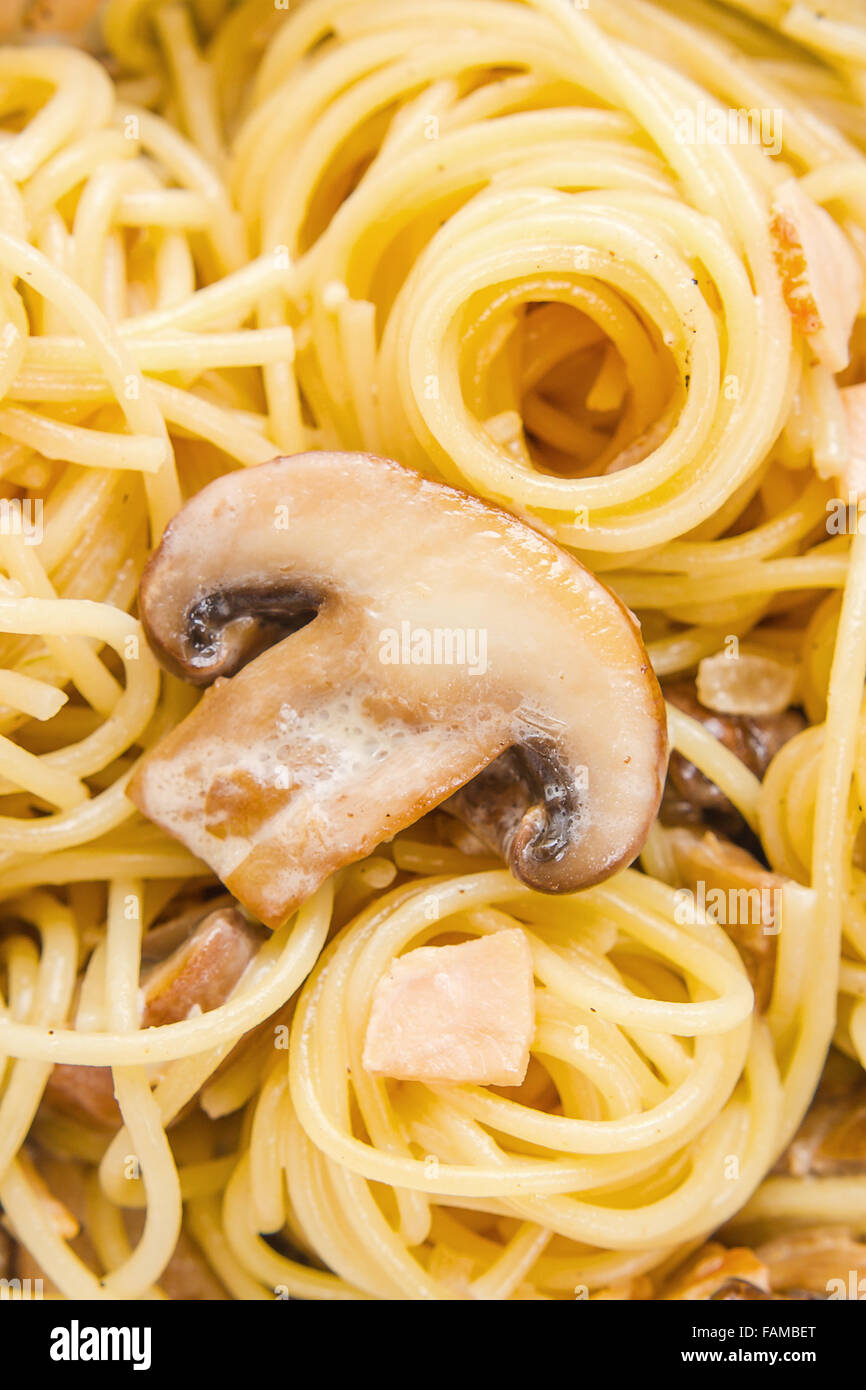 Spaghetti carbonara with mushroom, macro, soft focus, top view Stock ...