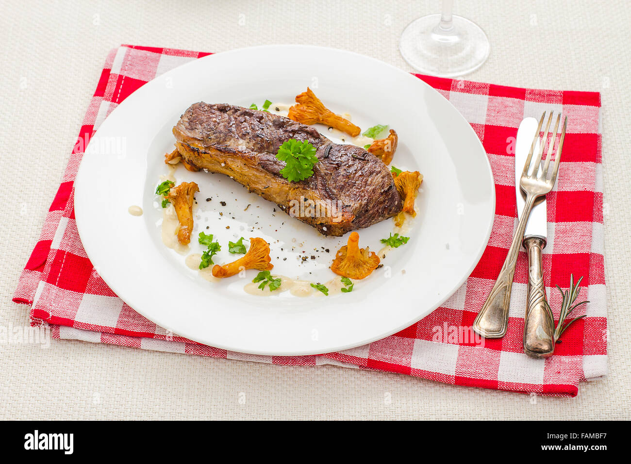 Grilled rump steak with chanterelle mushrooms and cream sauce Stock ...