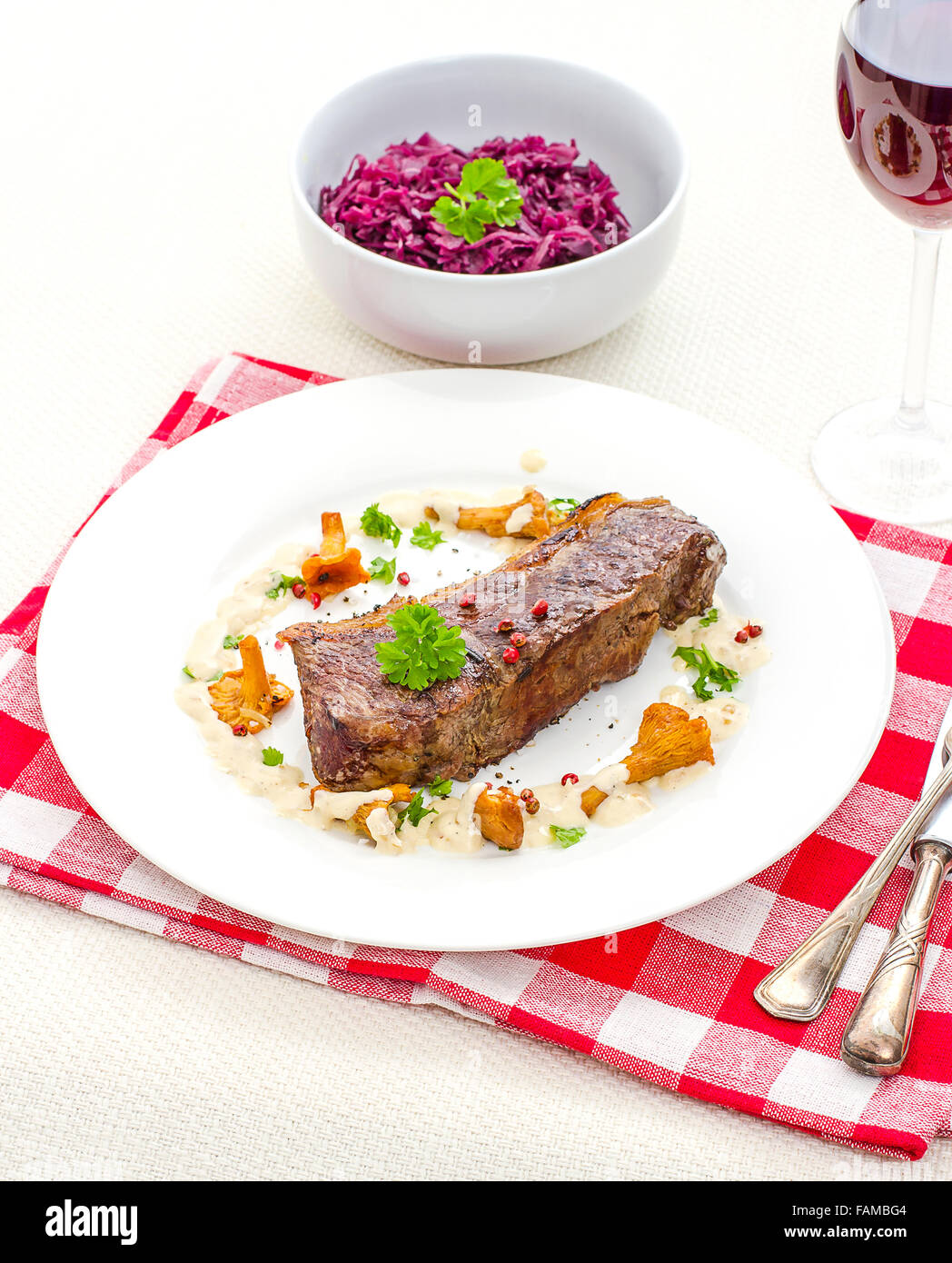 Grilled rump steak with chanterelle mushrooms and cream sauce Stock ...