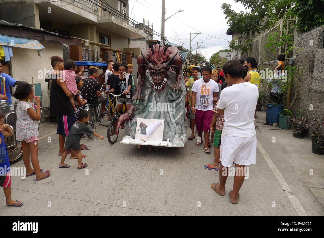 Malabon City, Philippines. 31st Dec, 2015. A demon-like creature effigy ...