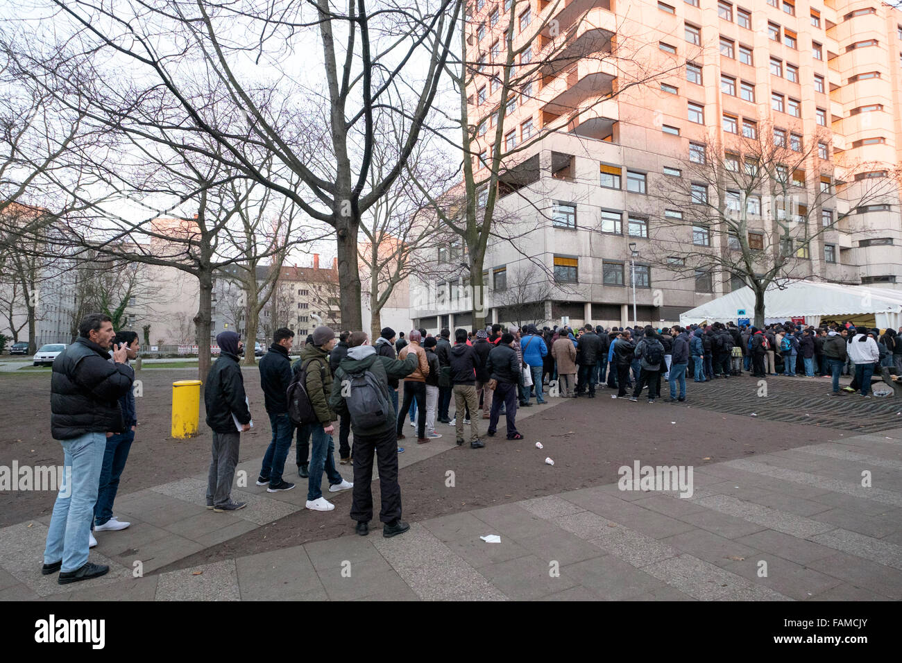 Refugees queue to be processed and registered Stock Photo - Alamy