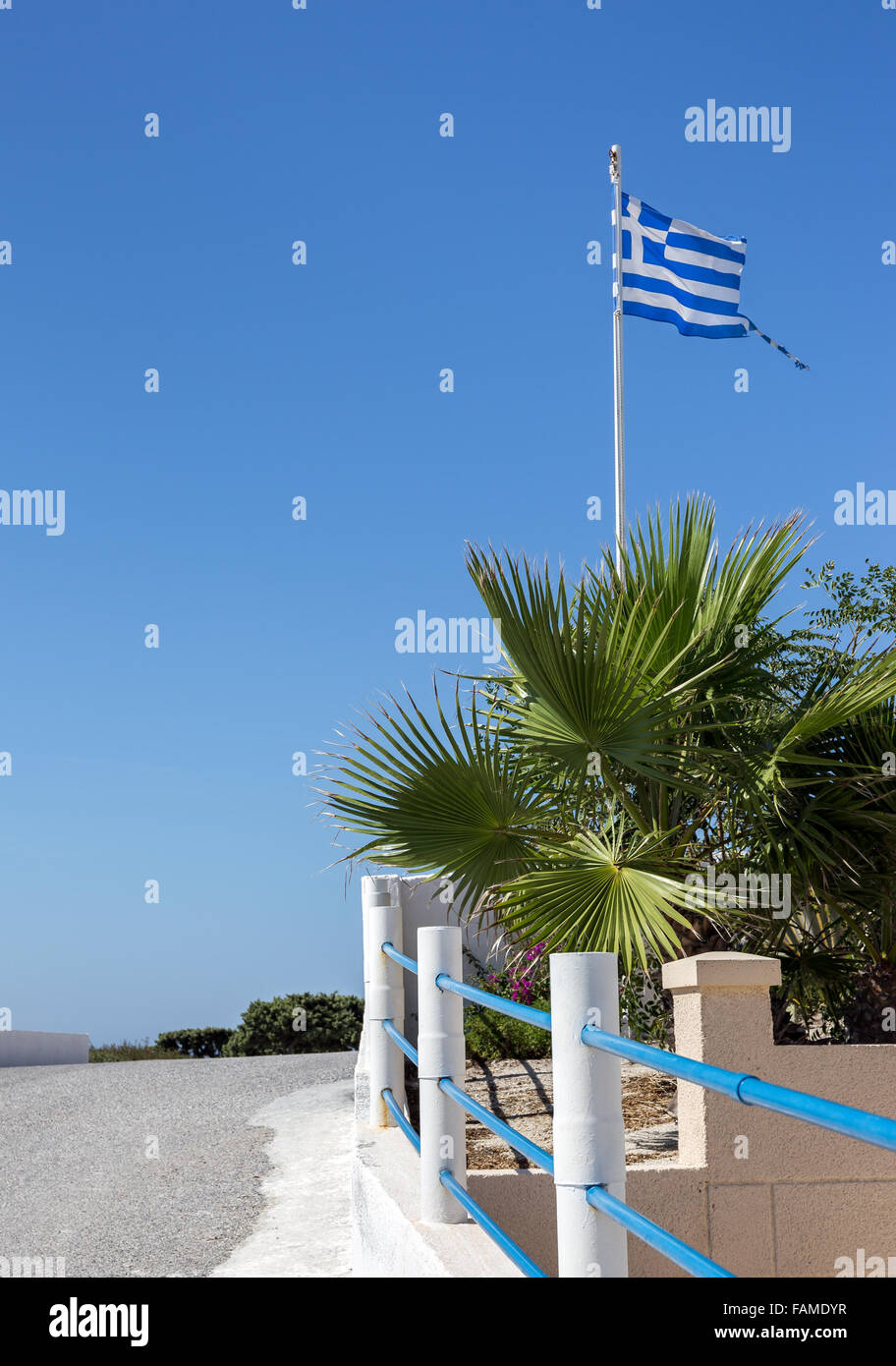 Greek flag on Kos Mediterranean island coastline Stock Photo - Alamy